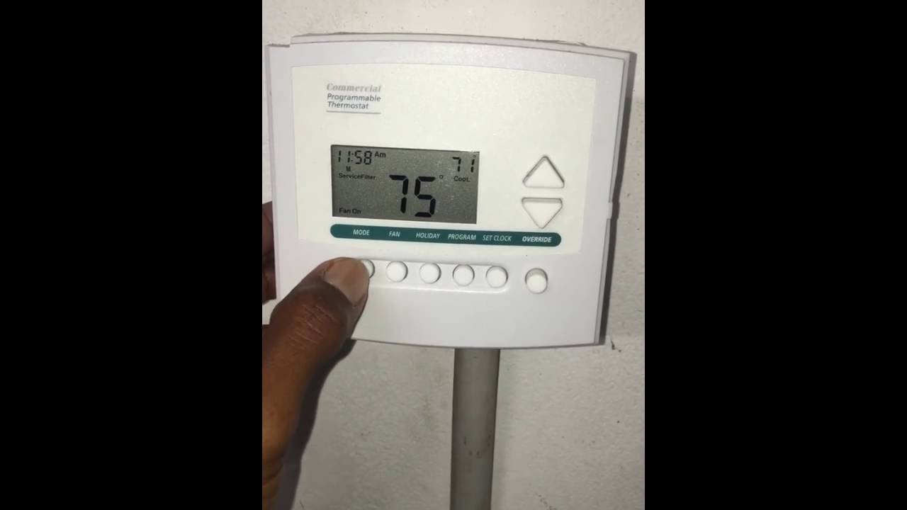 Going through the various Mode options on a Commercial Programmable Thermostat