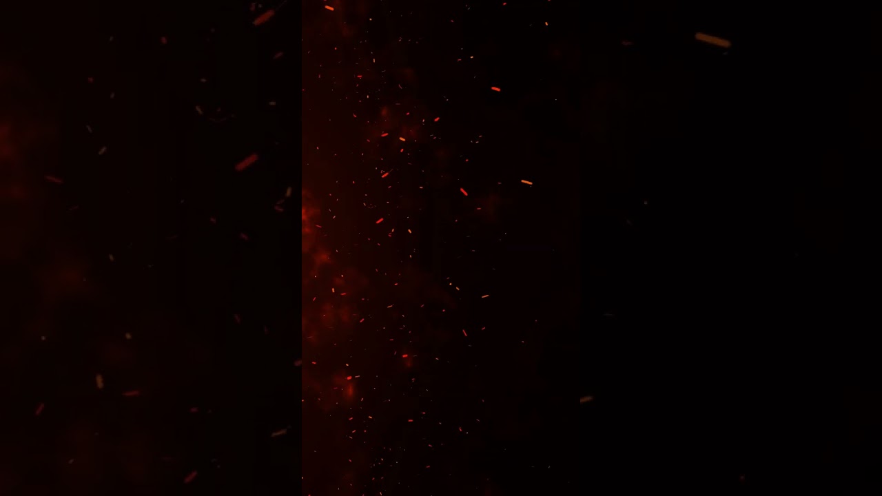 4k fire embers fire Particles sparks over black background, Fire flames particles swirls in the air.