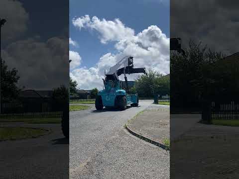 Konecranes SMV4632 reach stacker leaving after being checked.