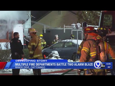 Multiple fire departments battle two alarm blaze