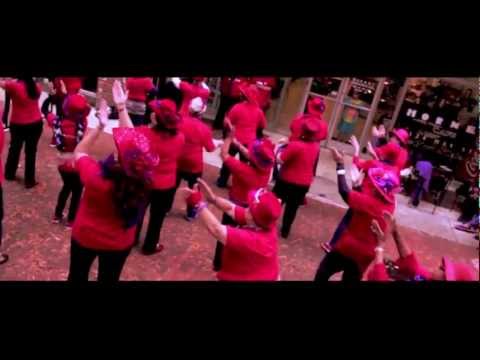 Red Hat Society performs Flash Mob