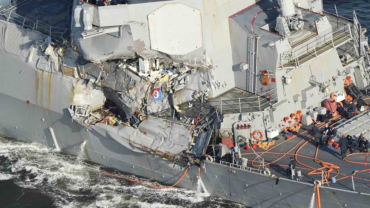 Significant damage to US Navy ship in deadly collision