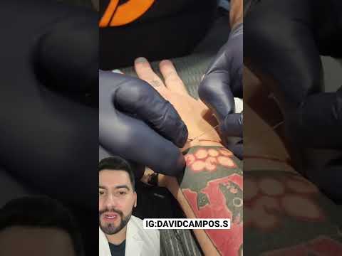 TATUAJE CON AGUJA EN LA MANO