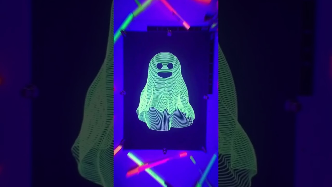 Using some neon pens with the #axidraw #penplotter - looks so great in #uvlight #shorts