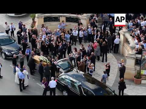Hundreds attend funeral of slain Maltese journalist