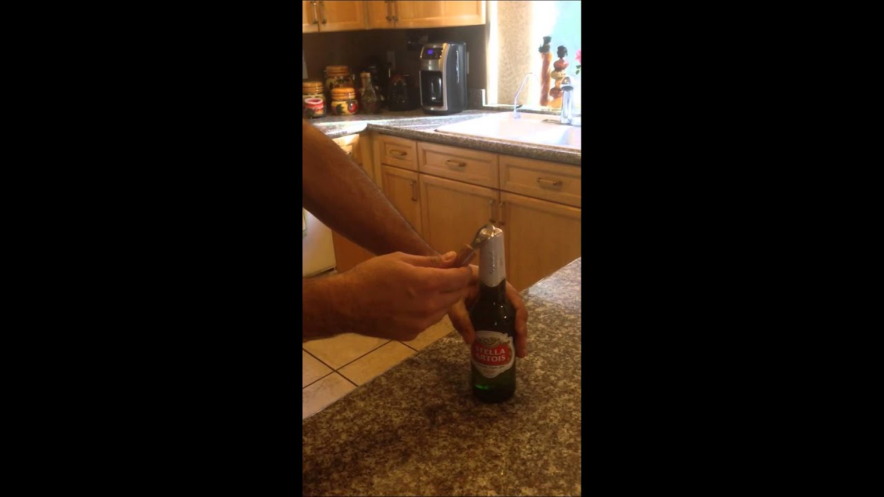 How to open a beer using a bottle opener