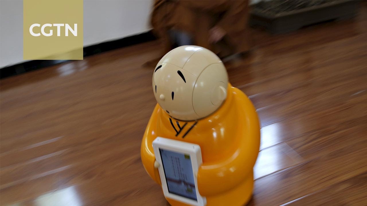 Robot monk spreads Buddhist teachings in Beijing