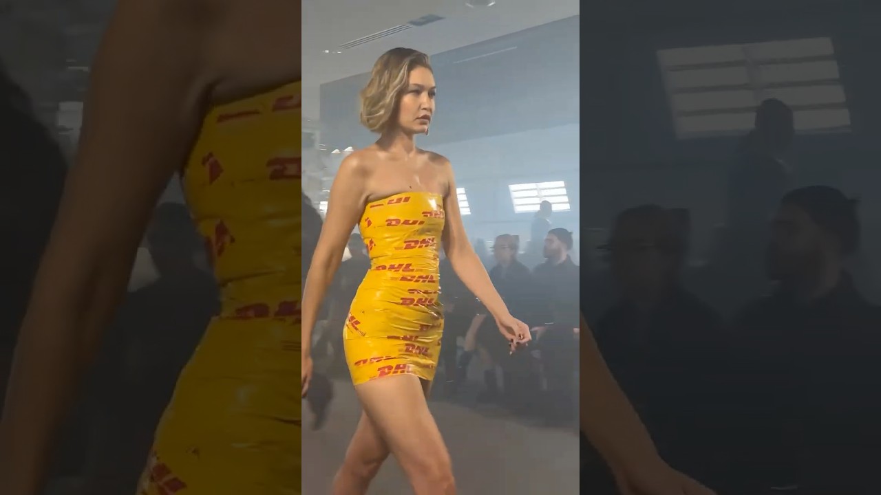 GIGI HADID IN A DHL TAPE DRESS 4K