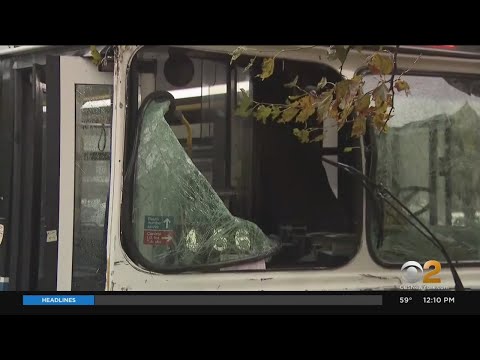 Bus Jumps Curb After Collision In Brooklyn