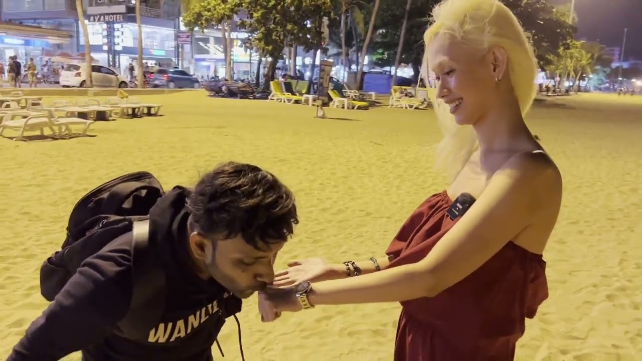 watch as this feminine ladyboy learns magic at Pattaya Beach