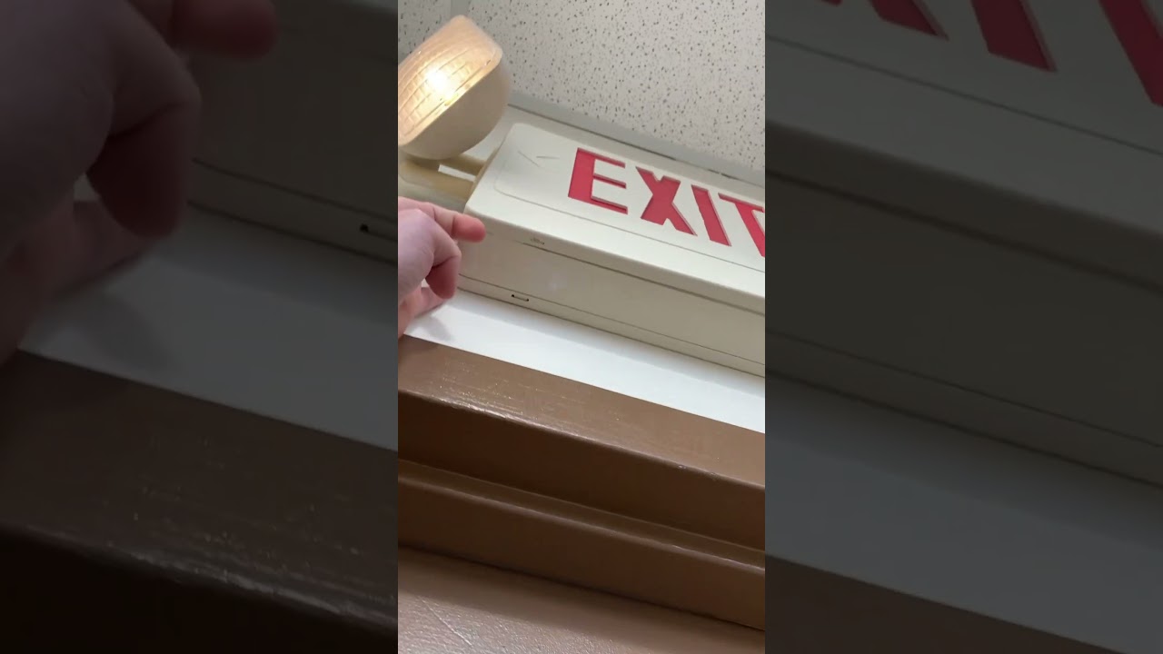 Testing an exit sign with incandescent emergency lights at a doctors office