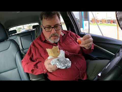 Eating Rili-B's Bacon Egg & Cheese Burrito at Volta EV Charger, Mesa, Arizona