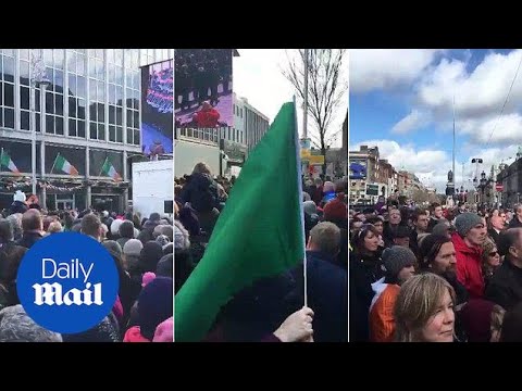 Crowds gather by iconic Spire of Dublin for Easter Rising parade - Daily Mail