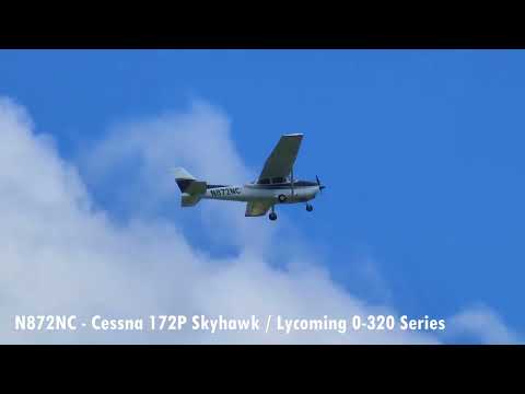 Cessna 172P Skyhawk P Flying Low Over New Century AirCenter (JCI), KS - N872NC