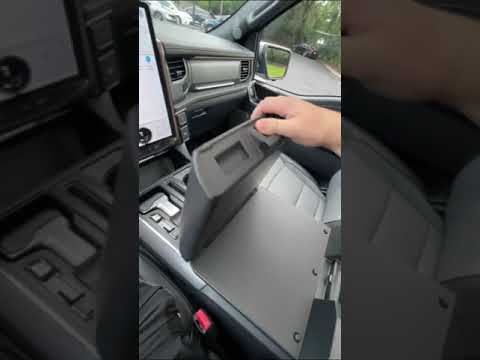 The Ford F150 has a folding table for food or to use as a work station