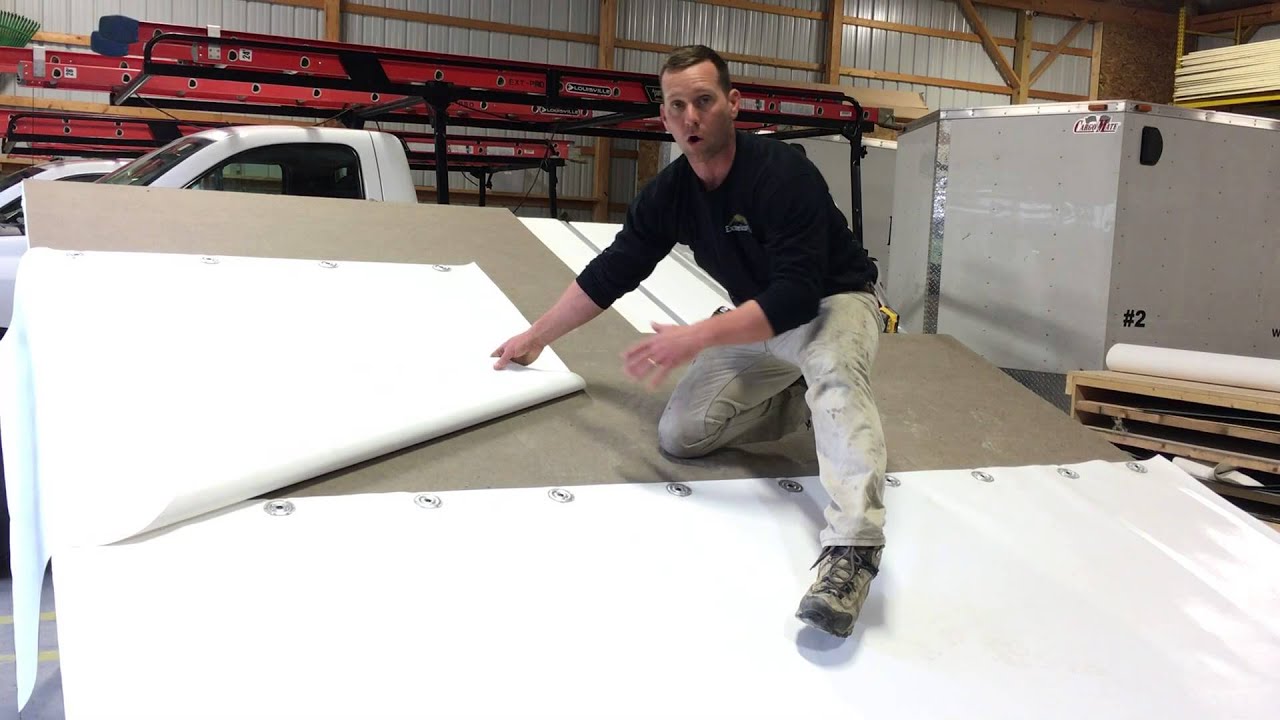 Flat Roof Installation (Fully Adhered vs Mechanically Attached)