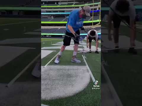 SoFi Stadium Grounds Crew painting the football field for 2022 NFL week 1 Chargers vs Raiders
