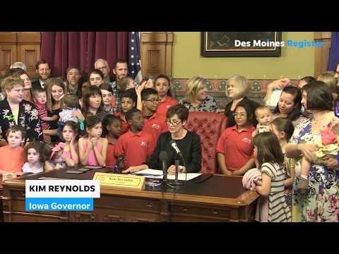Gov. Kim Reynolds signs Iowa's fetal heartbeat abortion bill into law