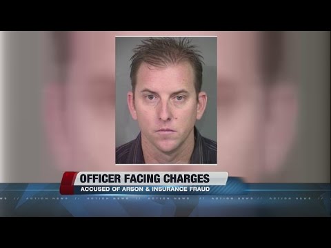 Officer charged in car insurance fraud case