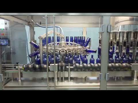 IC Filling Systems – ATEX rated rinsing filling CRYSTAL CORKER capping monoblock for spirits