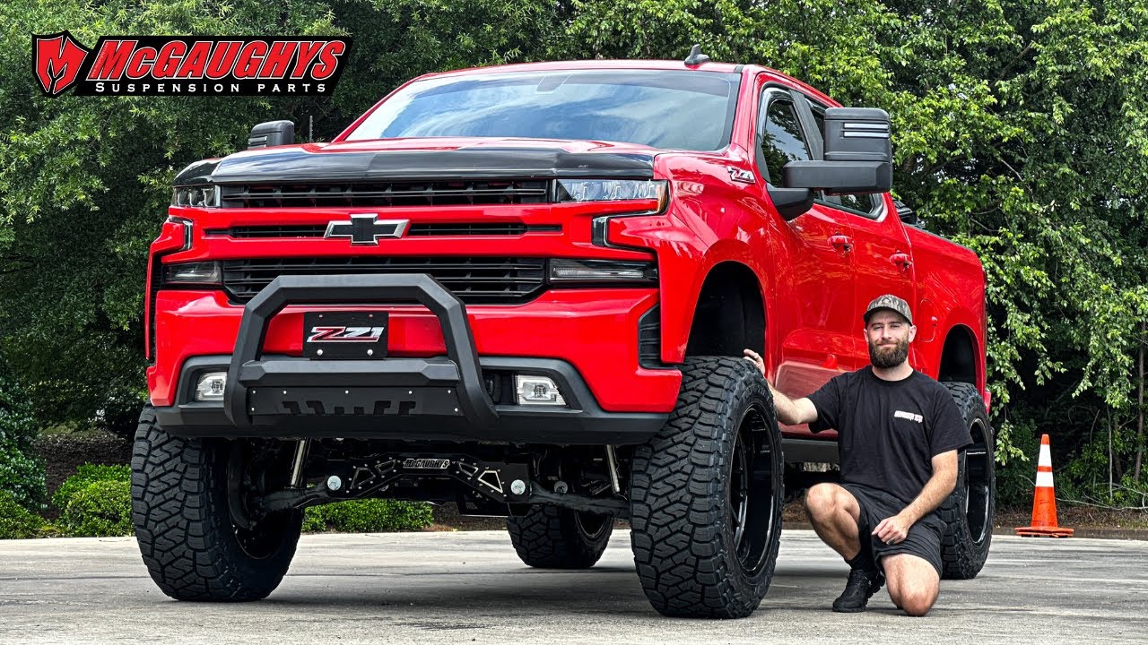 BIG, RED, & BOLD: Chevy Silverado RST on a 9” McGaughys lift & 37” Toyo RT Trail Tires