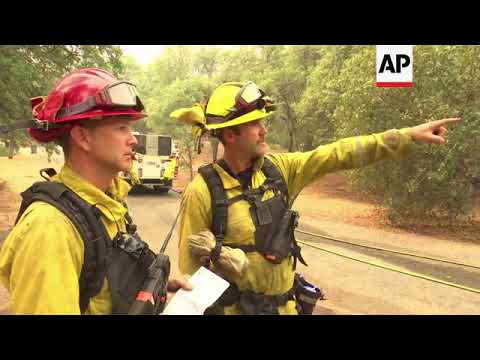 Firefighters Work Feverishly To Contain Blaze