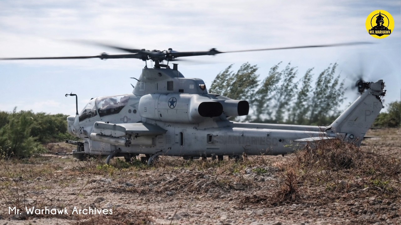 U.S. Marines with 2nd Marine Aircraft Wing refuel an AH-1Z Viper Helicopter