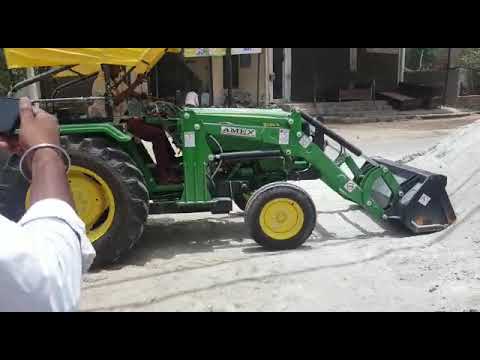 FRONT AND LOADER ATTACHMENT
