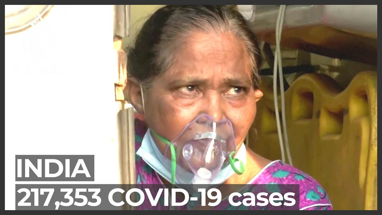 India reports another record daily rise in COVID infections