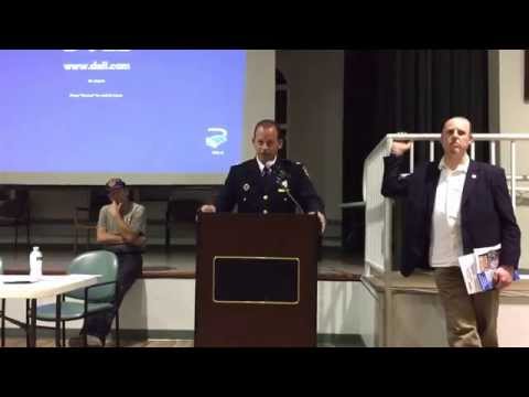 Answers question about parking and traffic enforcement in 34th Precinct.