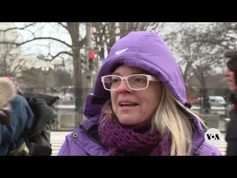 Tens of thousands defy frigid weather for Trump’s inauguration | VOA News