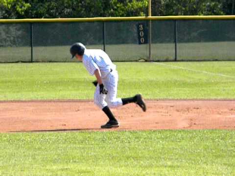 Kinder High School Freshman Brandon Norris stealing 2nd base