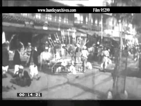 A street in a town India in the 1930's. Archive film 95299