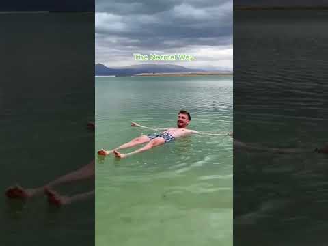 The water of the Dead Sea is over 34% salt, so you literally float! 🌴 #shorts