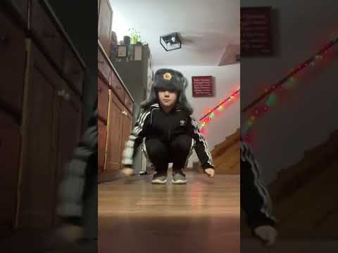 doing the most russian thing with the normal clothes russians wear:Soviet ushanka, Adidas tracksuit