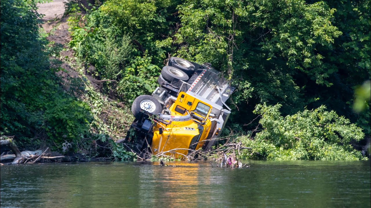PennDOT dump truck overturned into Schuylkill River in Reading