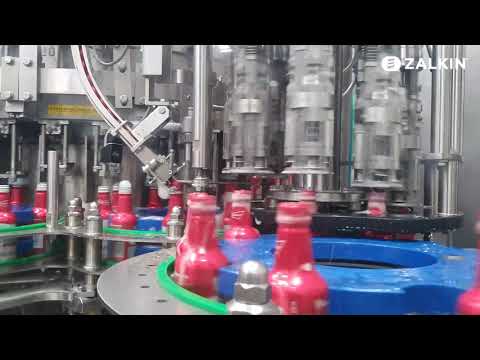 Beer roll-on sealing turret at 8,000 bottles per hour