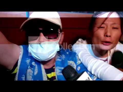 MALAYSIA: CHINESE MOTHER OVERCOME BY GRIEF
