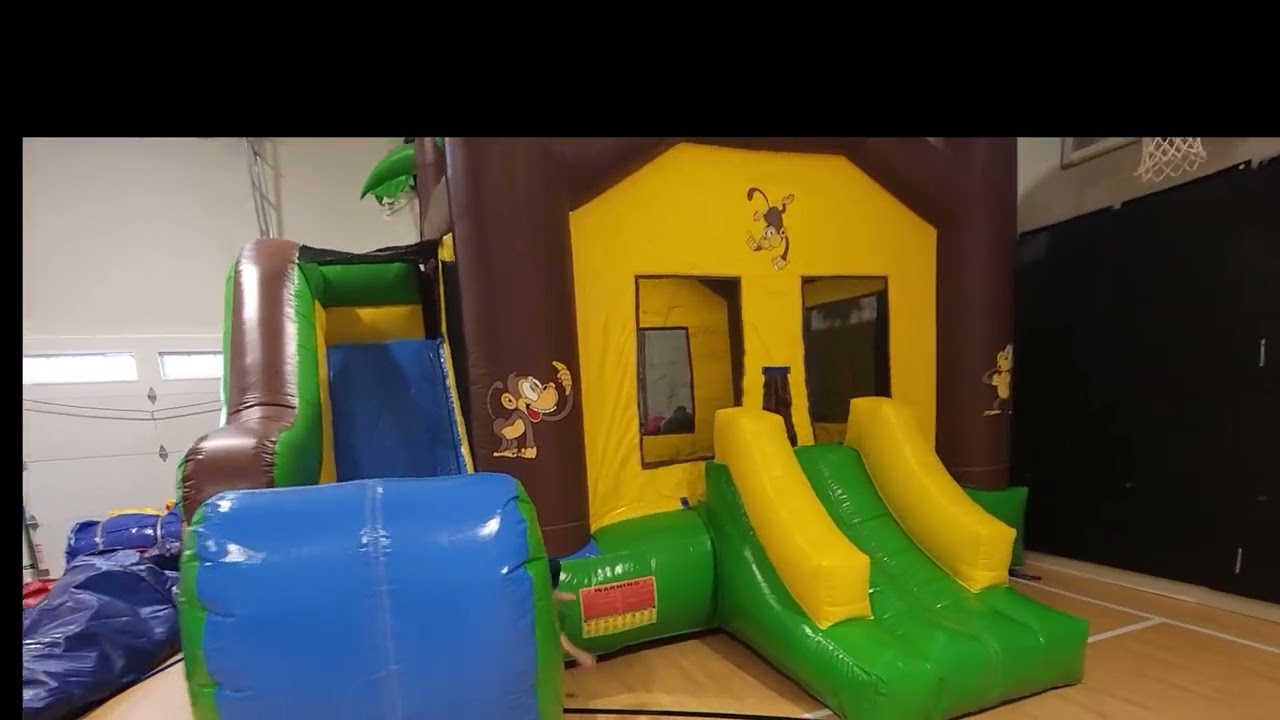 jungle modular bounce house with slide rental in grand rapids michigan