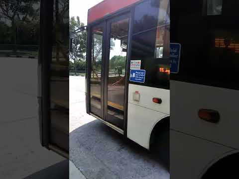 SBS Transit Scania K230UB Euro 4 refurbished Departing bus stop with red wheel nuts SBS8165G