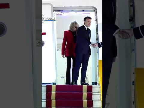 Moment French President Macron’s face is pushed away in Vietnam