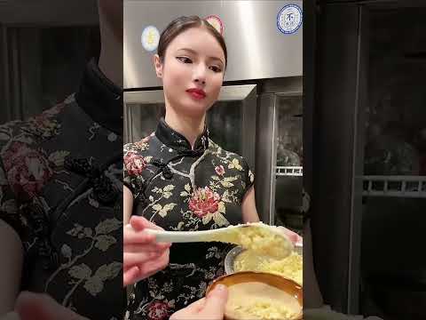 A Robotic Waiter Serves Food at a Chongqing Hotpot Restaurant in China