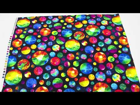 black with colorful circle planet fabric by Timeless Treasures