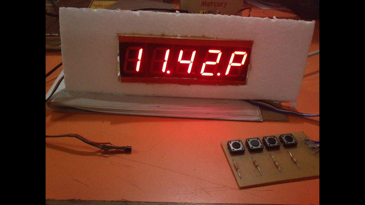 seven segment  clock with temperature  display   using   ds1307  and ds18b20