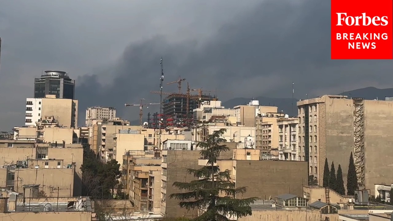 Black Smoke Clouds Hover Over Tehran After Major Strikes On Oil Facilities