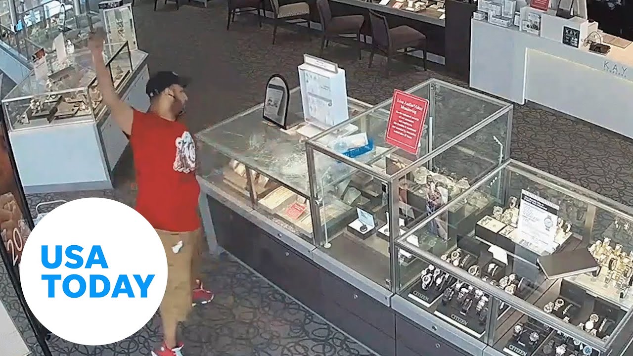 Man fails to break into jewelry display case with brick | USA TODAY