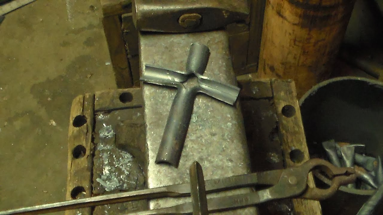 Blacksmith's split cross forged from pipe