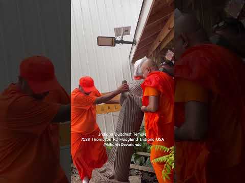 Bhante Devananda, Bhante Nanda, Bhante Sugunadhamma and Metta Team Installing Stone Rupam