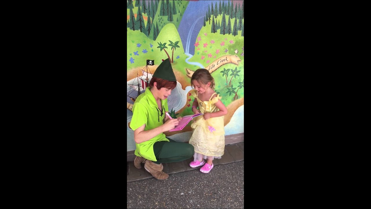 Daisy meeting Peter Pan at Magic Kingdom walt Disney world