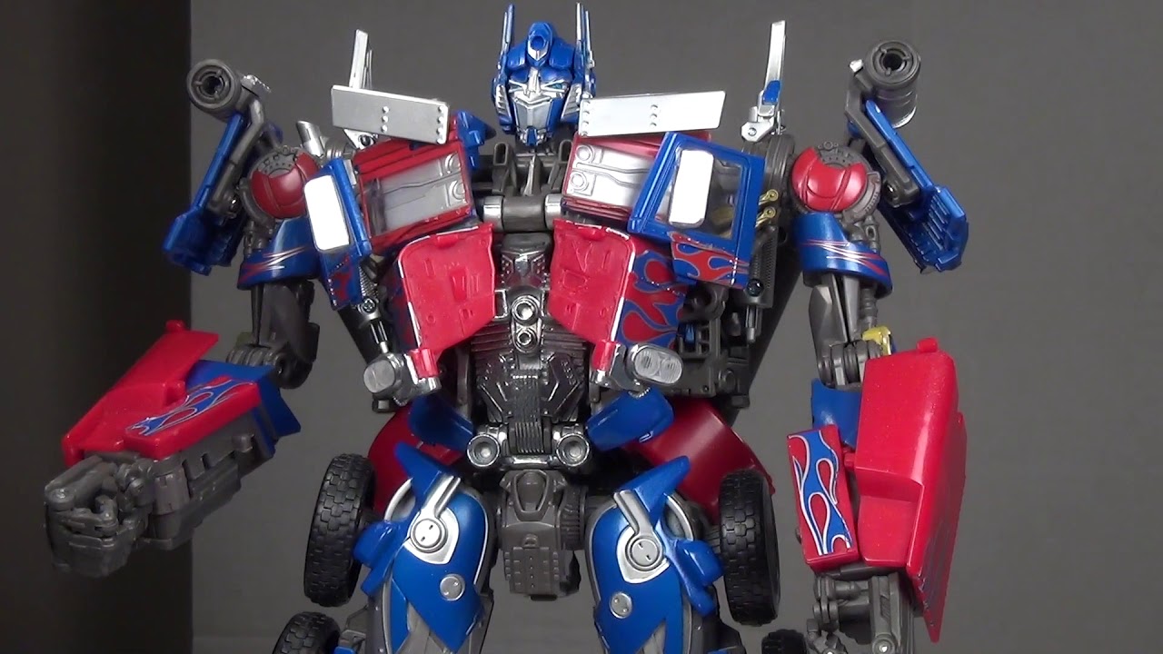 MPM-4 Masterpiece Movie Optimus Prime transformation guide both modes & review